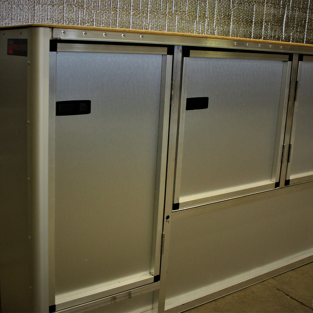 Sprinter 144 Wheel Well Cabinet - Trail Kitchens