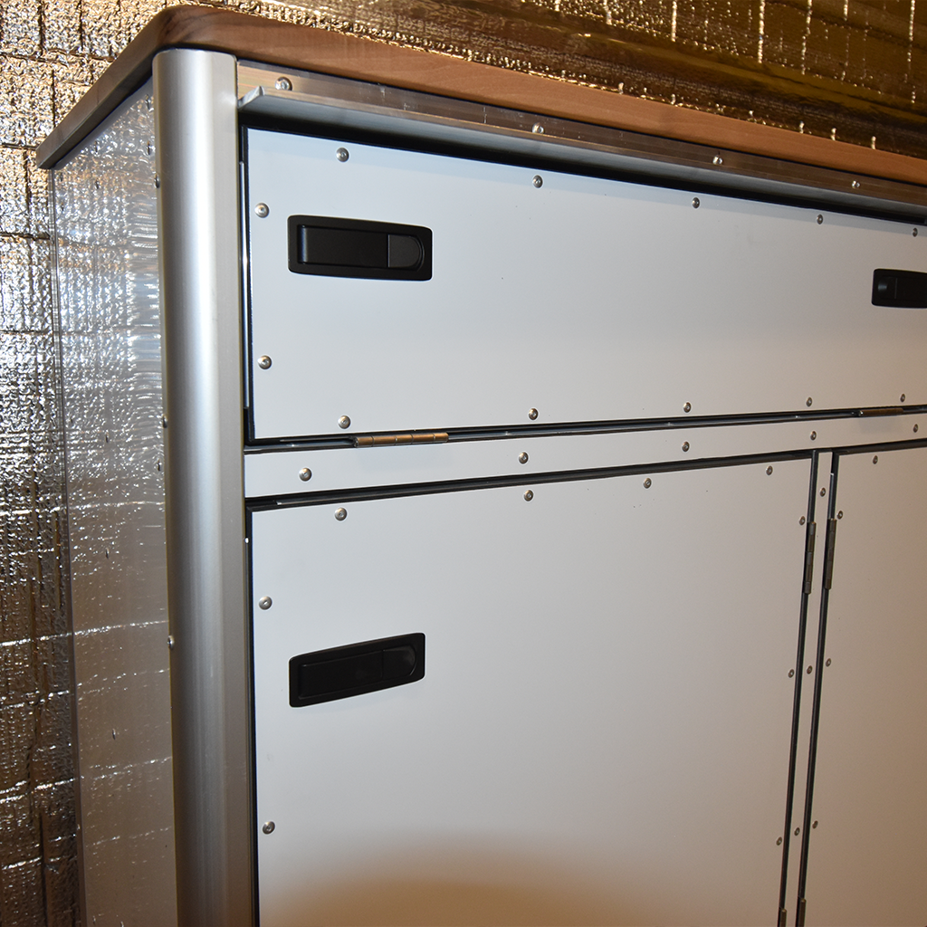 Sprinter 144 Wheel Well Cabinet - Trail Kitchens